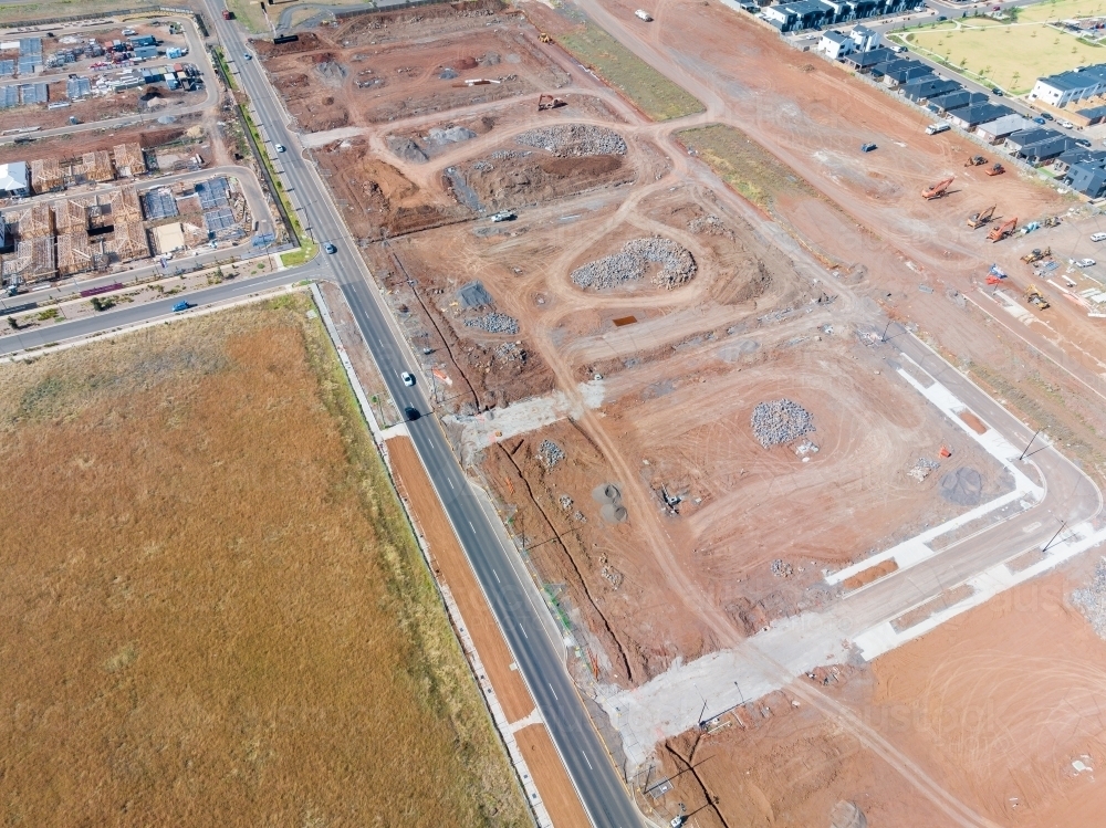 Image of Aerial view of cleared land blocks in an urban subdivision ...