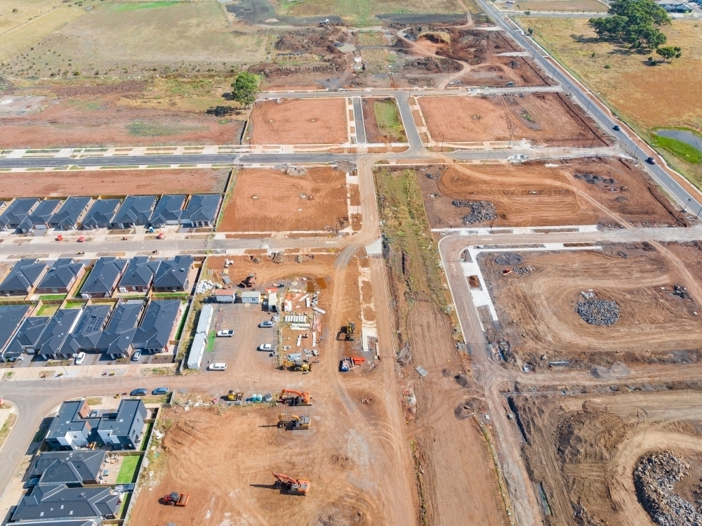 Image of Aerial view of cleared land blocks in an urban subdivision ...