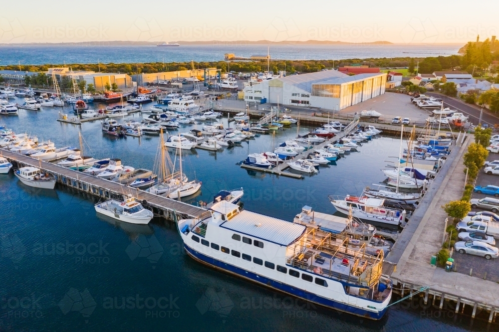 Image of Aerial view of coastal marina full of boats, yachts and ...
