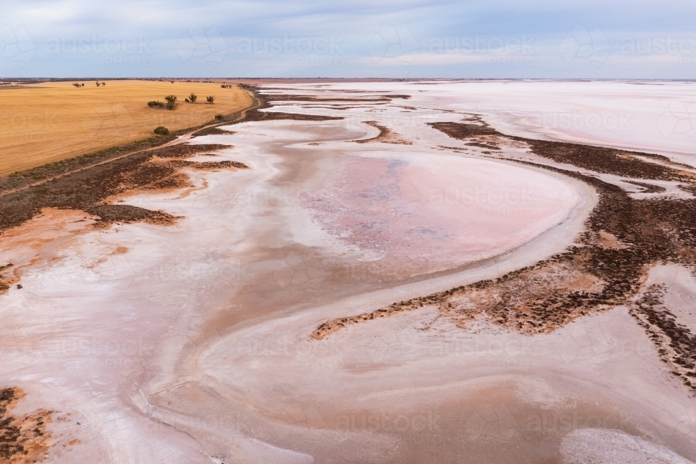 Image of Aerial view of colourful patterns in a dry salt lake ...
