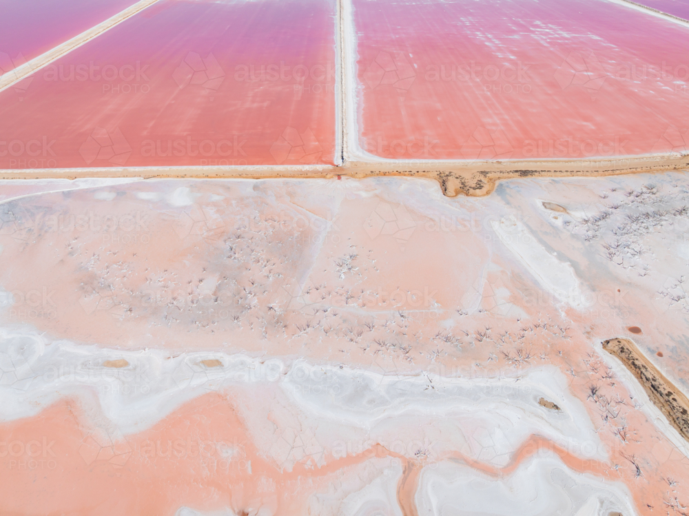 Image of Aerial view of colourful salt evaporation ponds and levee ...