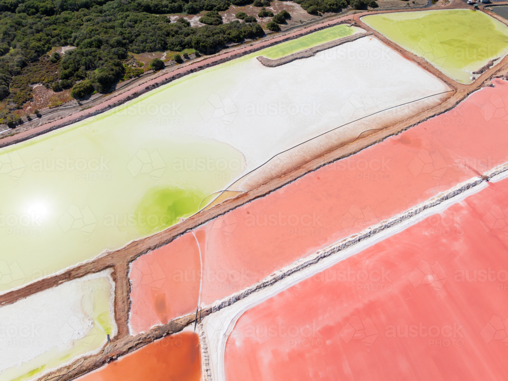 Image of Aerial view of colourful salt evaporation ponds and levee ...