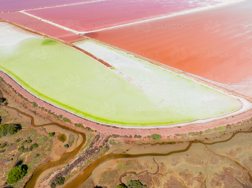 Image of Aerial view of colourful salt evaporation ponds and levee ...