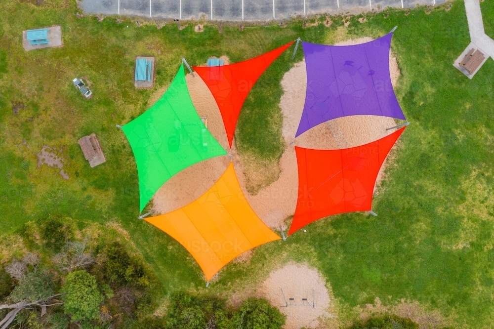 Image of Aerial view of colourful shade sails over a playground area ...