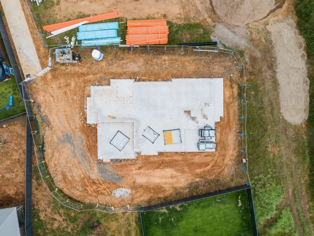 Image of Aerial view of concrete slab for new house build - Austockphoto