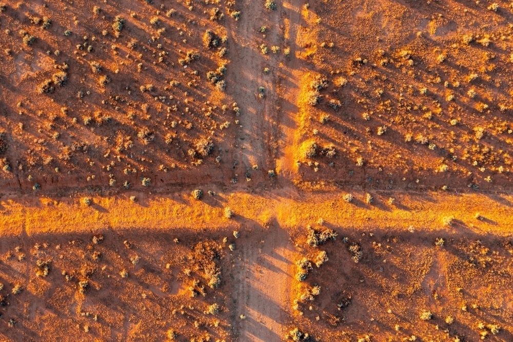 Image of Aerial view of crossroads of two dirt roads in the outback ...