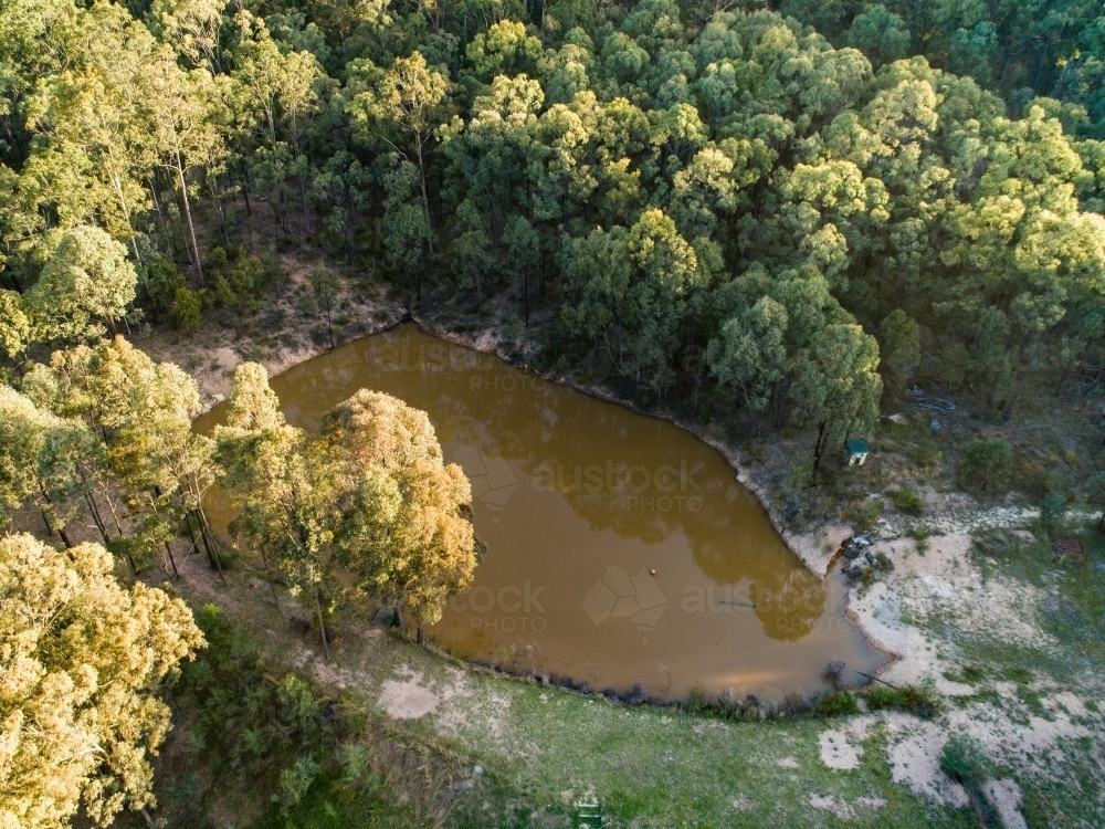 Image of Aerial view of dam on rural property - Austockphoto