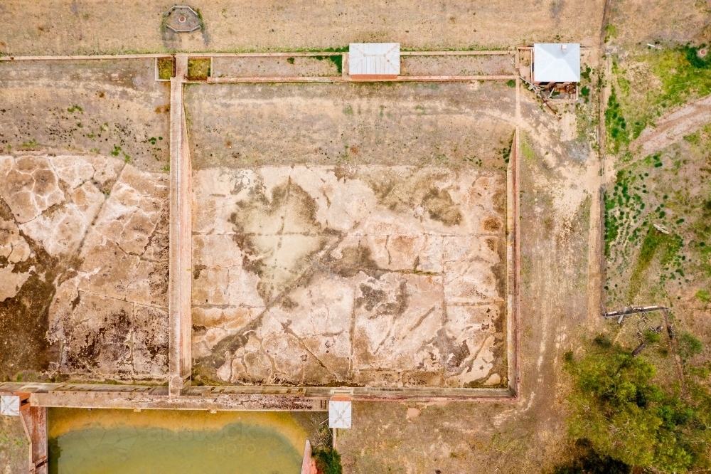 Image of Aerial view of disused settling ponds with muddy bottoms ...