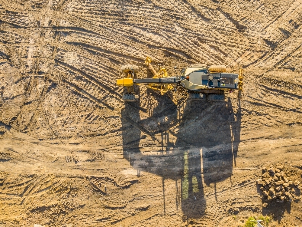 Image of Aerial view of earthmoving machinery on a construction site ...