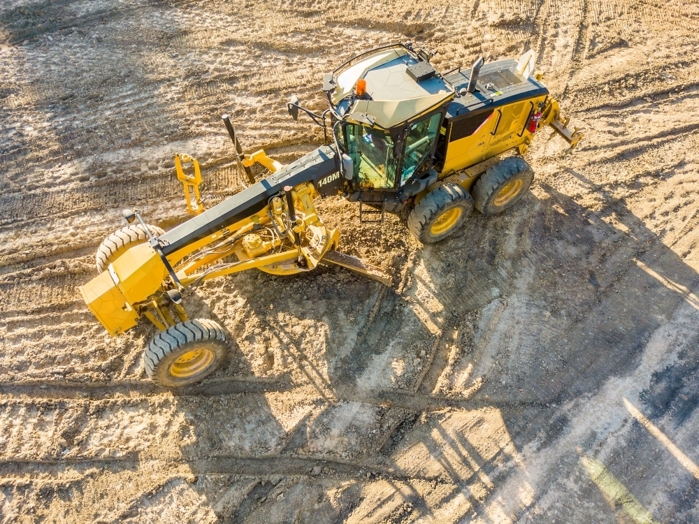Image of Aerial view of earthmoving machinery on a construction site ...