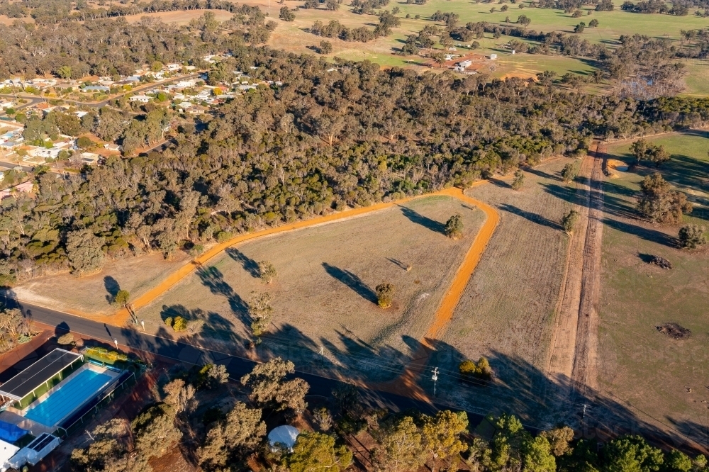 Image of Aerial view of empty space outside of small rural town ...