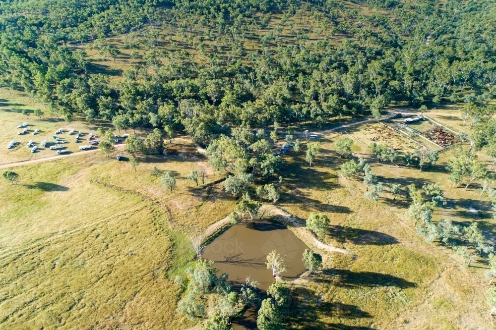 Image of Aerial view of farm homestead and cattle yards. - Austockphoto
