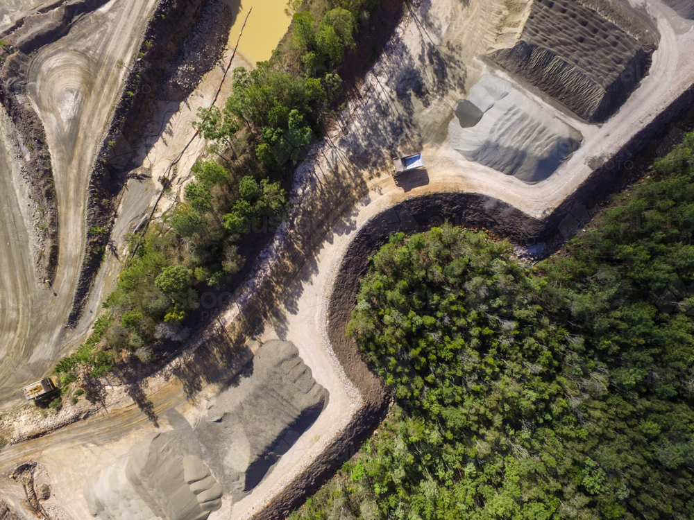Image of Aerial view of gravel and sand quarry. - Austockphoto