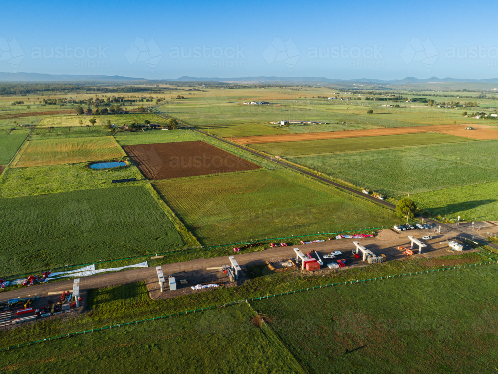 Image of Aerial view of green farmland in Singleton with beginnings of ...