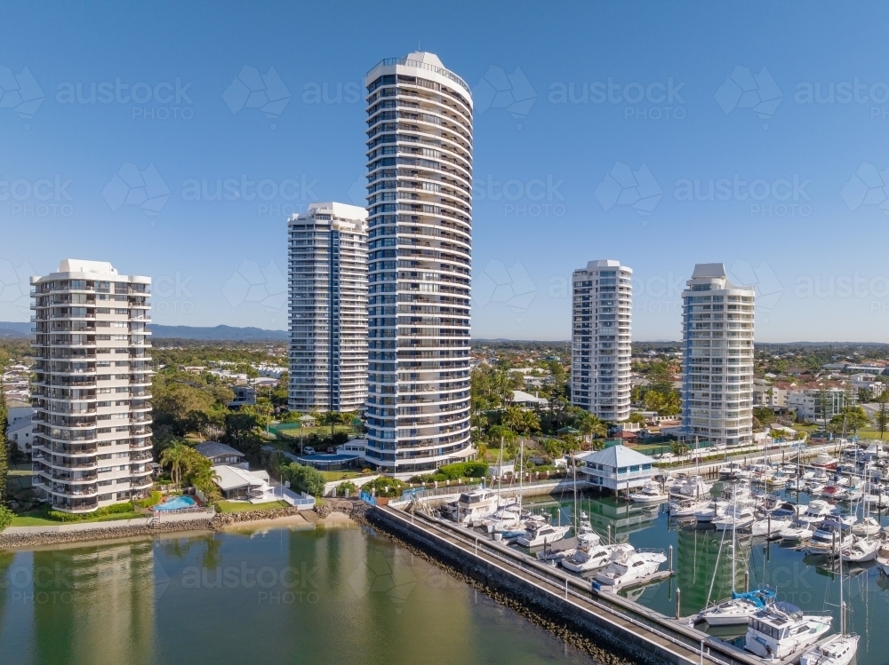 Image of Aerial view of high rise apartment towers and boat marina ...