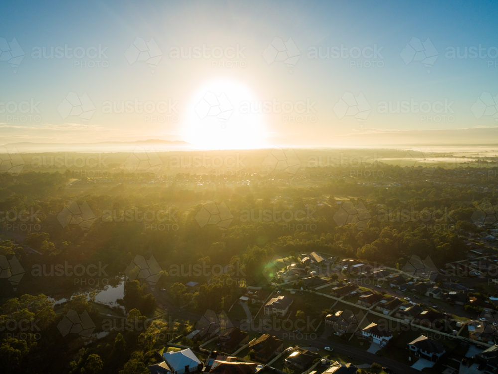 Image of Aerial view of houses in country town of Singleton with golden ...