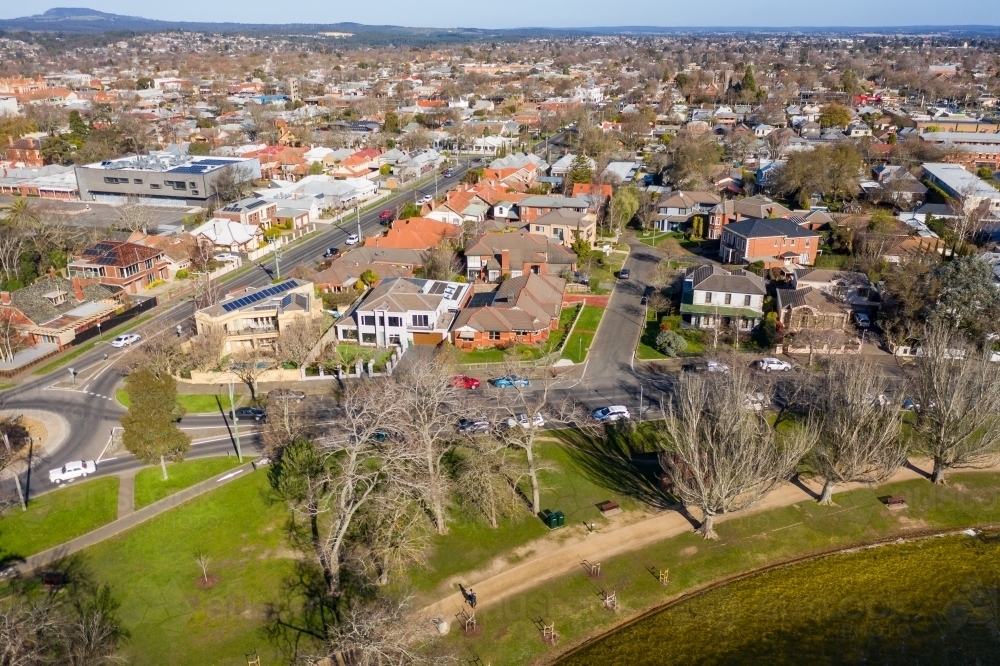 Image of Aerial view of housing and infrastructure in a lake side ...