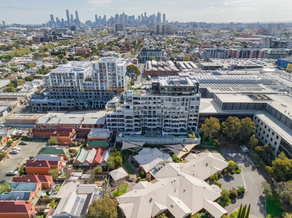 Image of Aerial view of inner city apartment buildings with skyscrapers ...