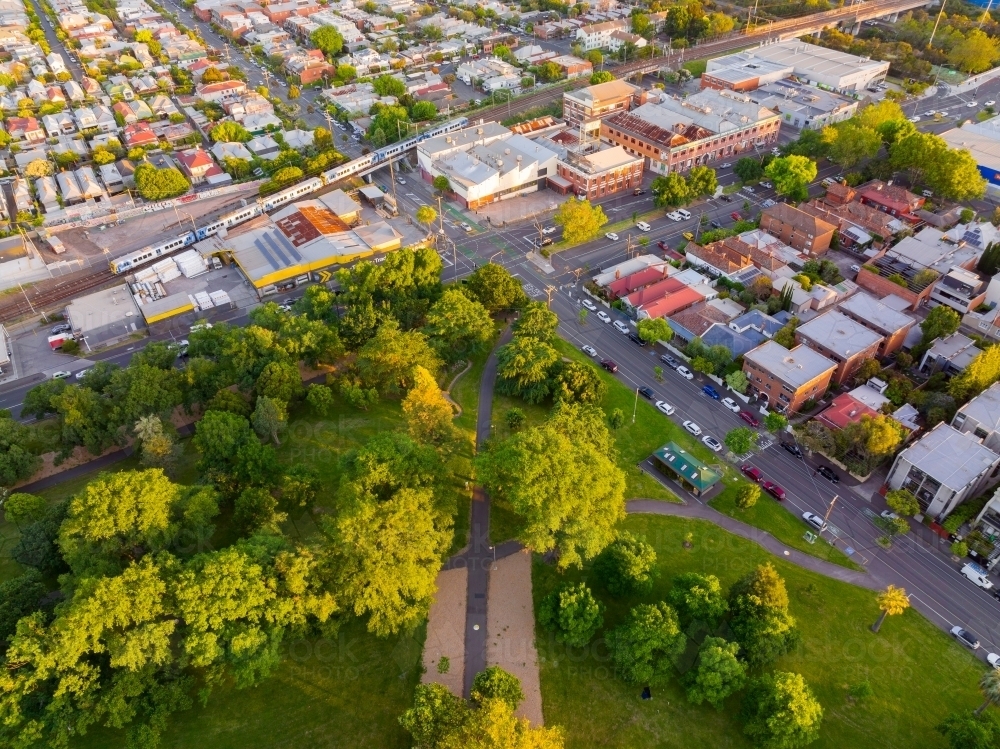 Image of Aerial view of inner city suburb and parkland in late ...
