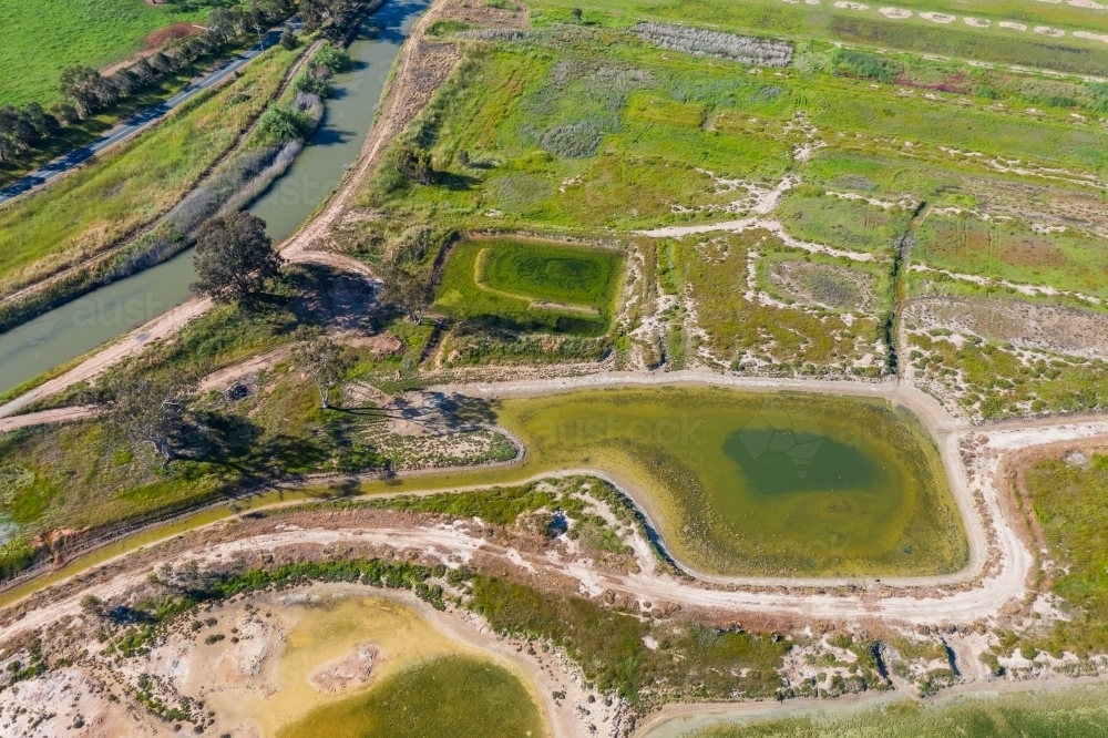 Image of Aerial view of irrigation channels and evaporation ponds ...