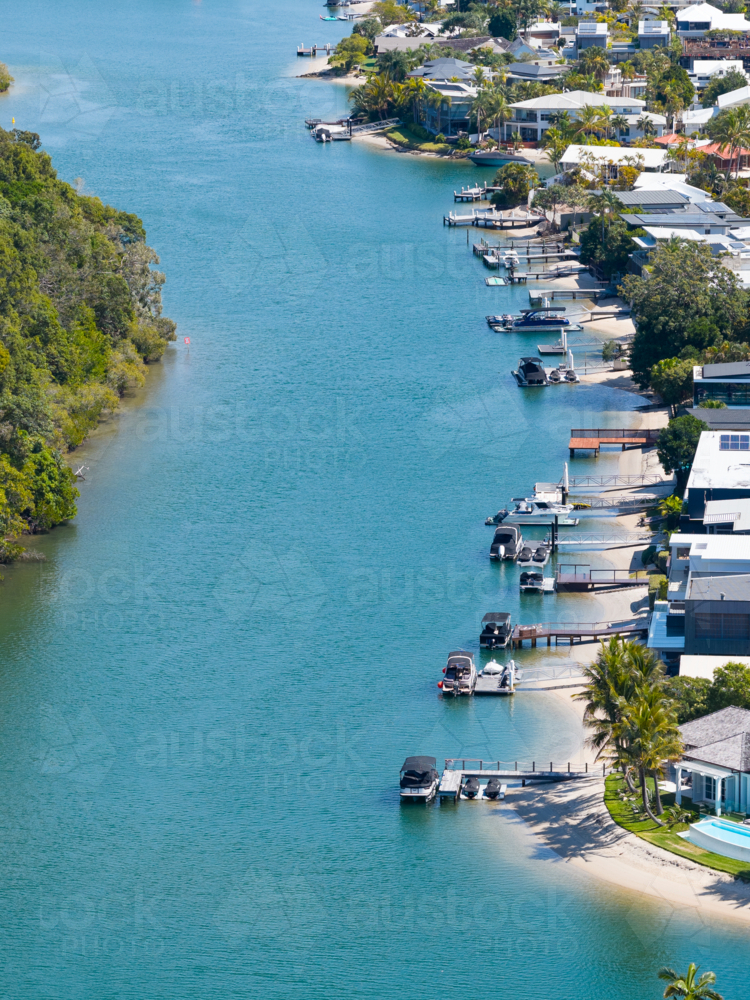 Image of Aerial view of jettys and pleasure boats along a coastal canal ...