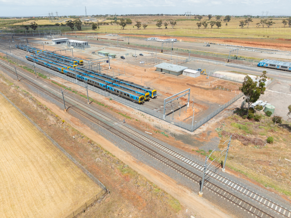 Image of Aerial view of metro trains lined up at a railway depot ...