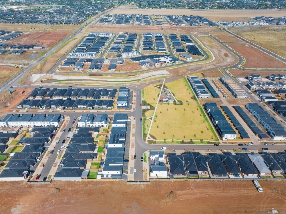 Image of Aerial view of new housing around a park in an urban ...