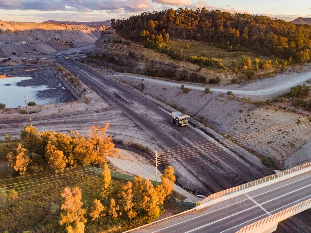 Image of Aerial view of open cut coal mine with water near Singleton ...