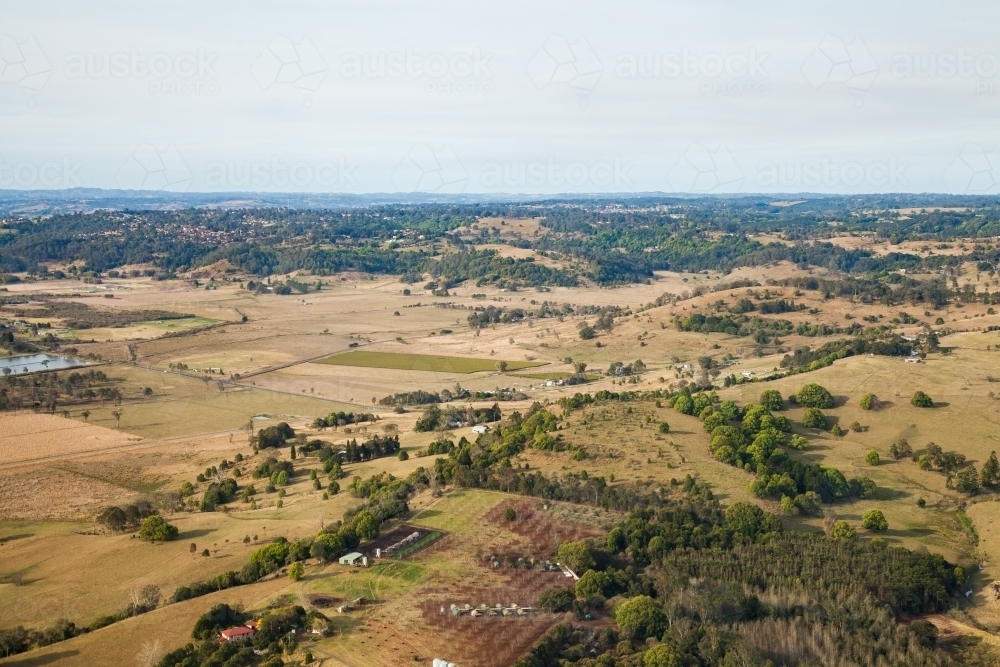 Image of Aerial view of paddocks and trees on australian farmland ...