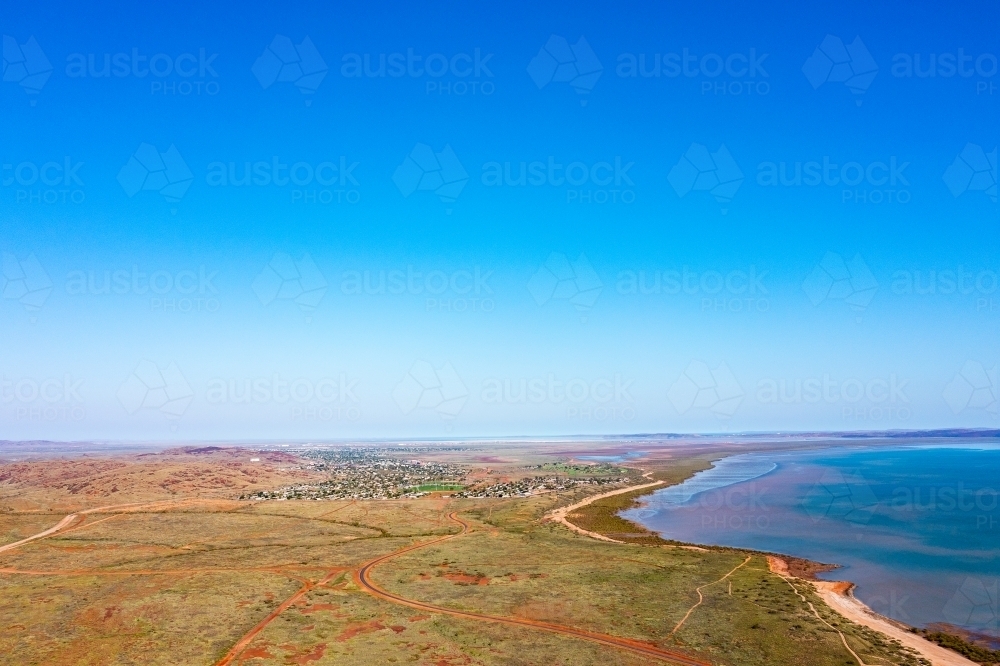 Image of aerial view of Pilbara coast with Karratha in the distance and ...