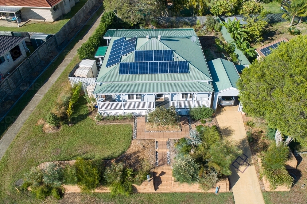 Image of Aerial view of Queenslander style house with solar panels ...