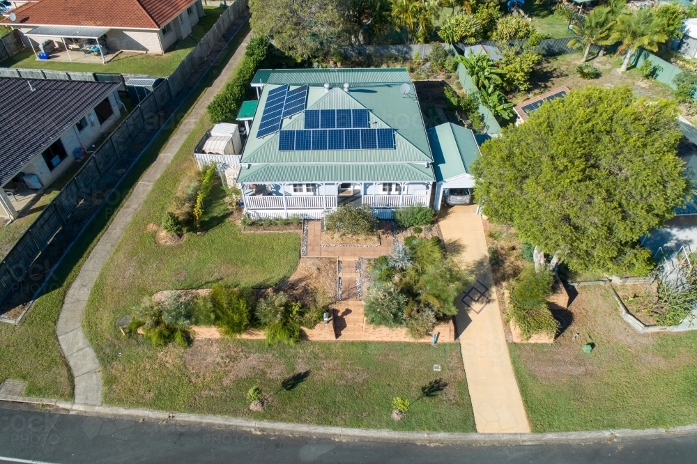 Image of Aerial view of Queenslander style house with solar panels ...