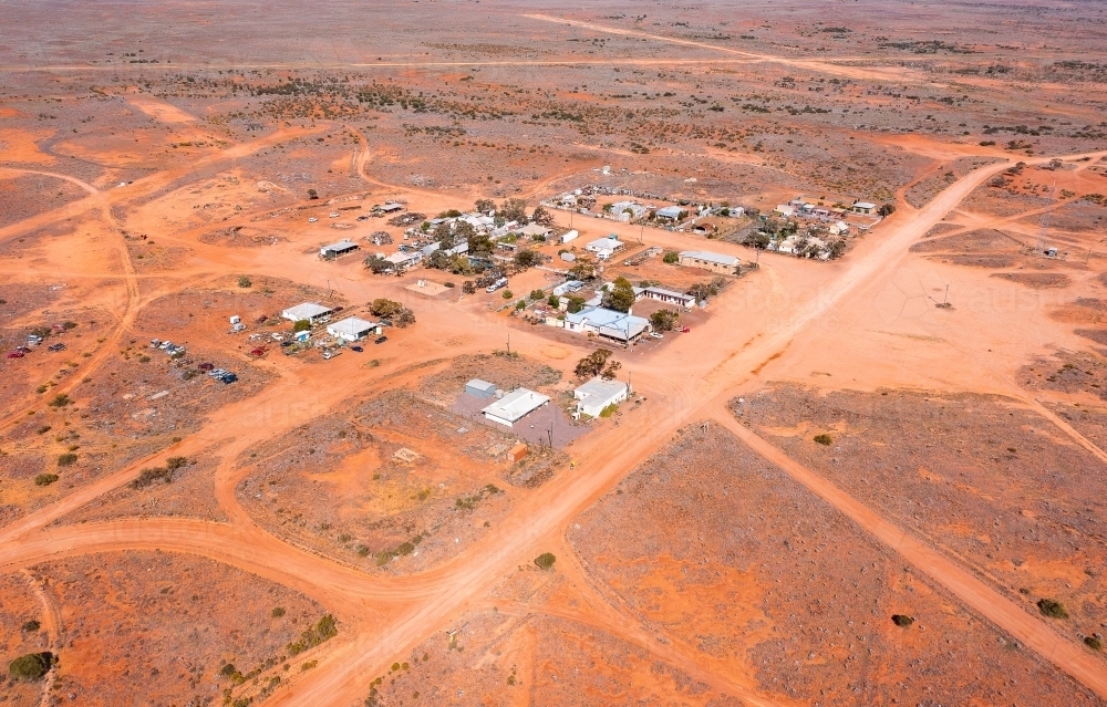 Image of aerial view of remote town showing multiple tracks and roads ...