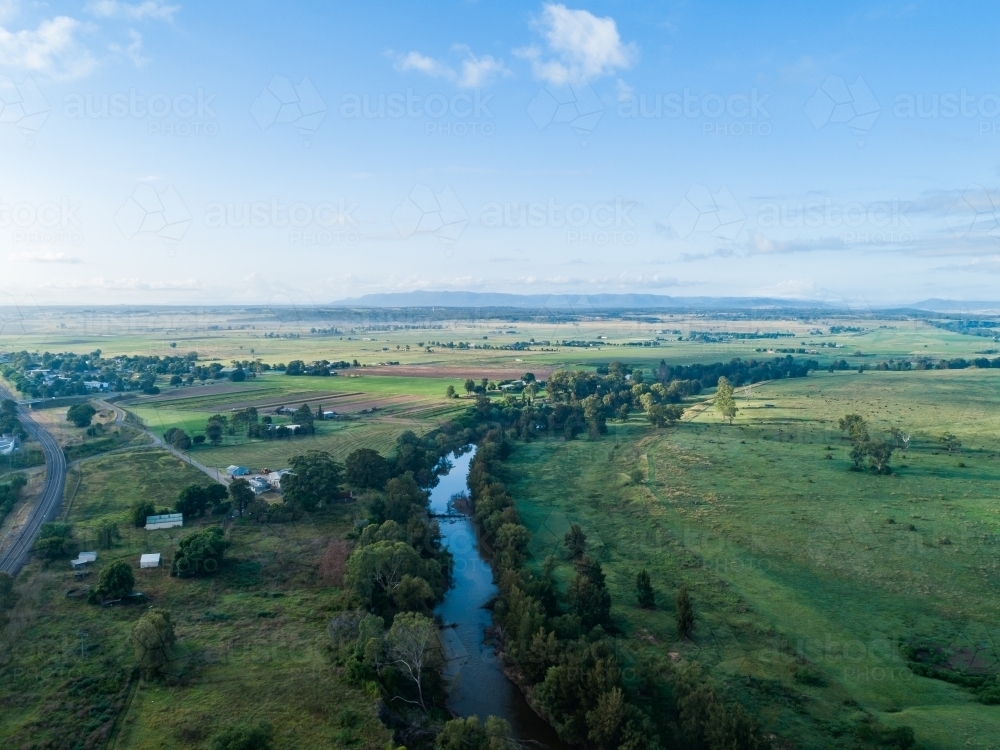 Image of Aerial View of River winding through green countryside in ...