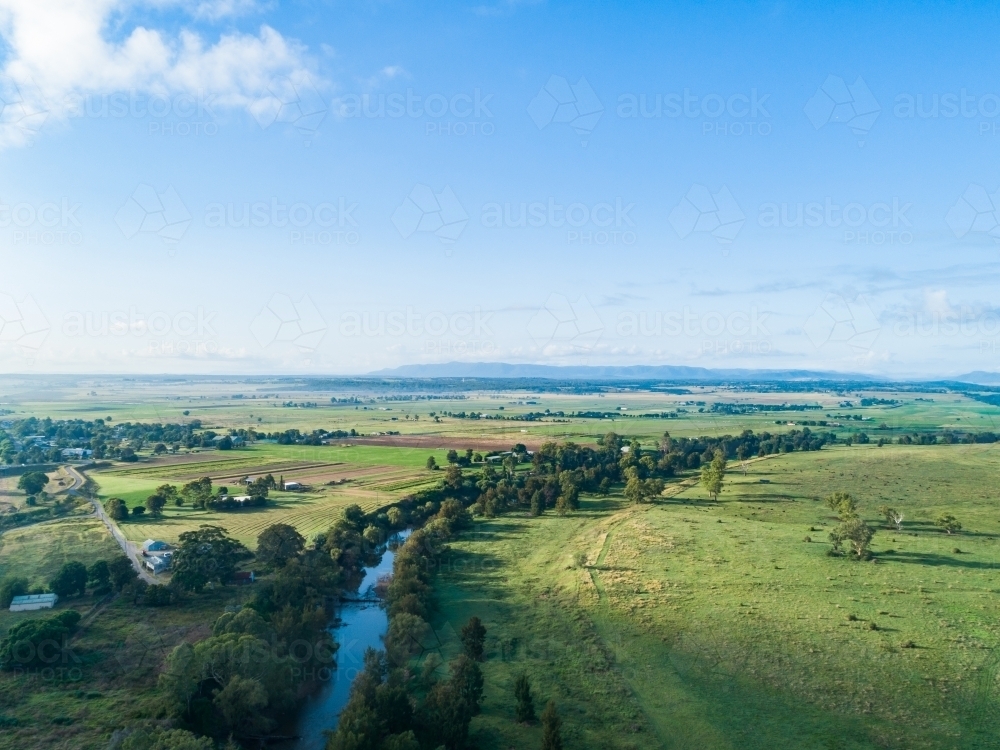 Image of Aerial View of River winding through green countryside in ...