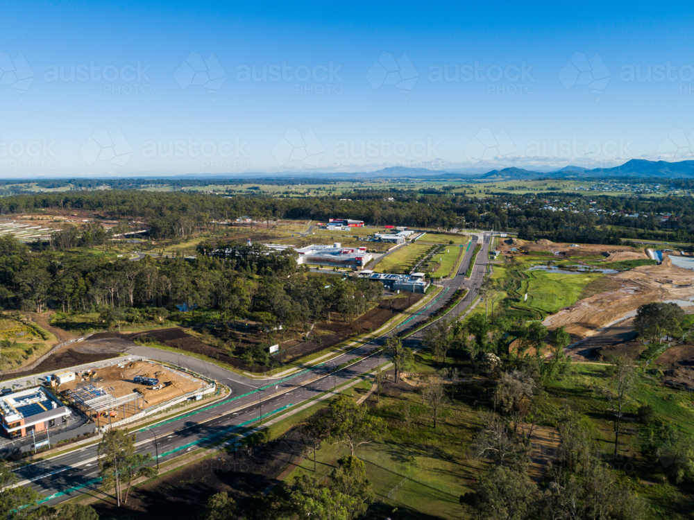 Image of Aerial view of road in Huntlee with new fast food and petrol ...