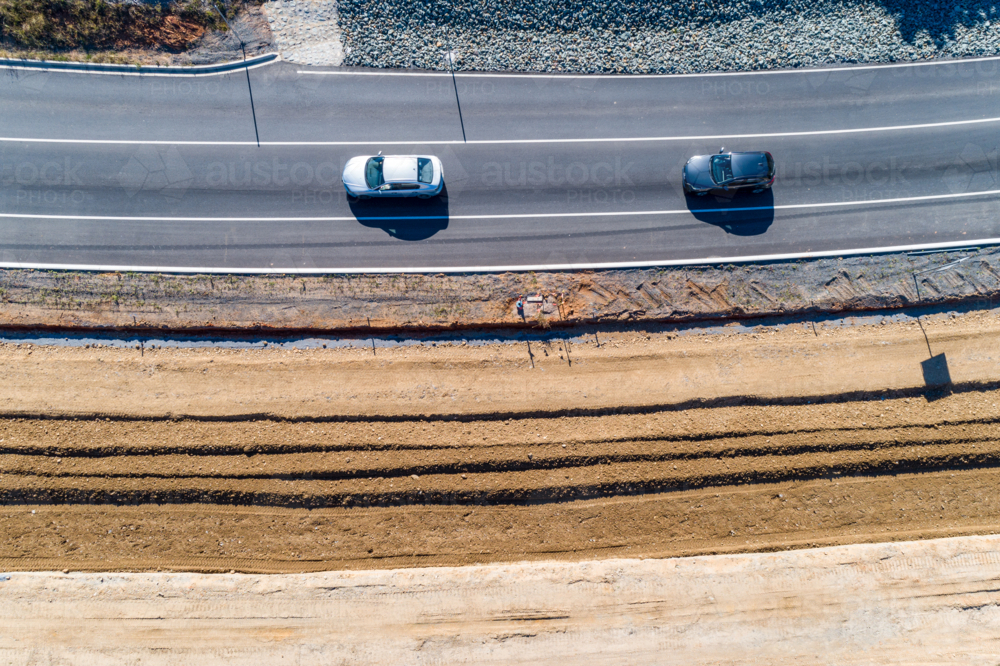 Image of Aerial view of road widening roadworks - Austockphoto