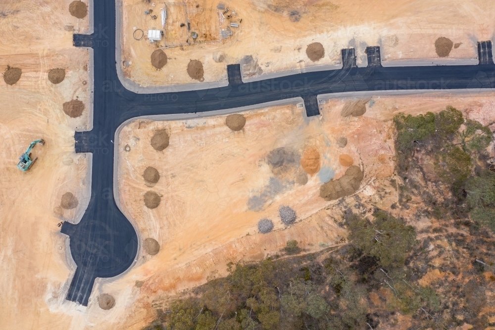 Image of Aerial view of roads and house blocks in a new housing ...