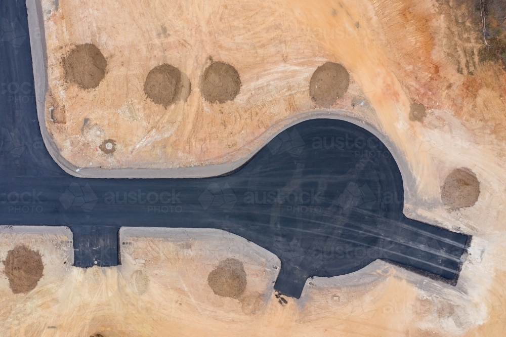Image of Aerial view of roads and house blocks in a new housing ...