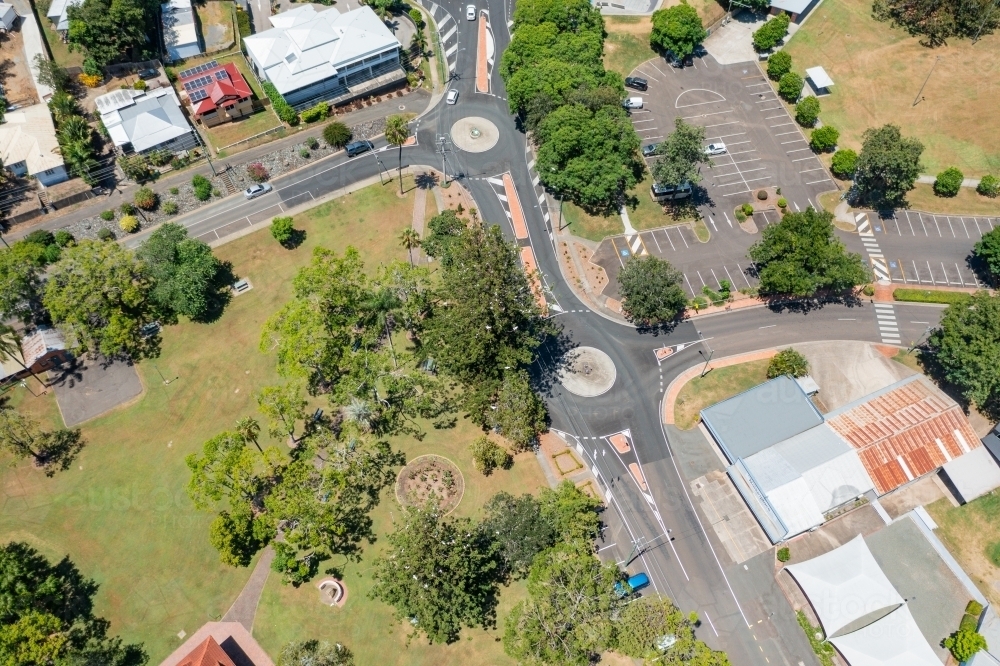 Image of Aerial view of roads and roundabouts around a park in a ...