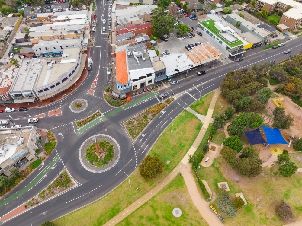 Image of Aerial view of roads and roundabouts running through a ...