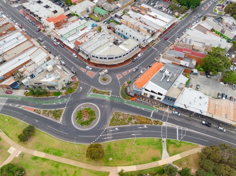 Image of Aerial view of roads and roundabouts running through a ...