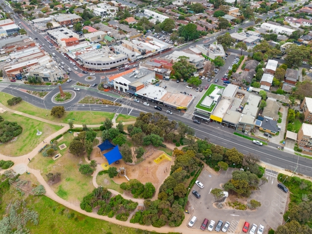 Image of Aerial view of roads and roundabouts running through shopping ...