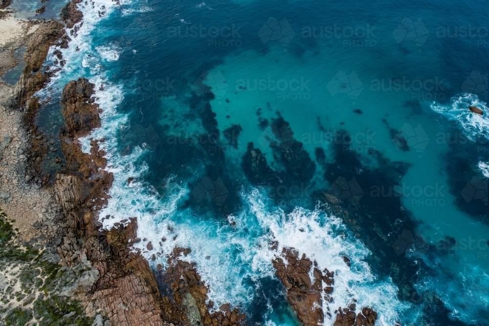 Image of Aerial view of rugged coastline. - Austockphoto