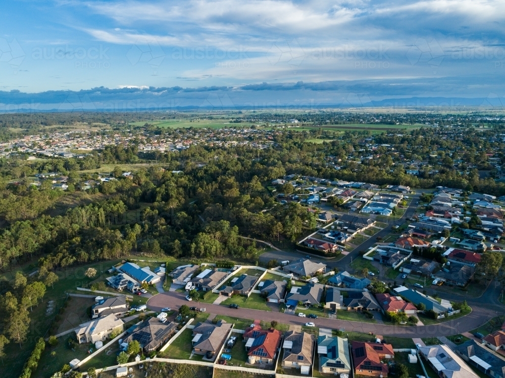 Image of Aerial view of scattered streets of country town - Austockphoto