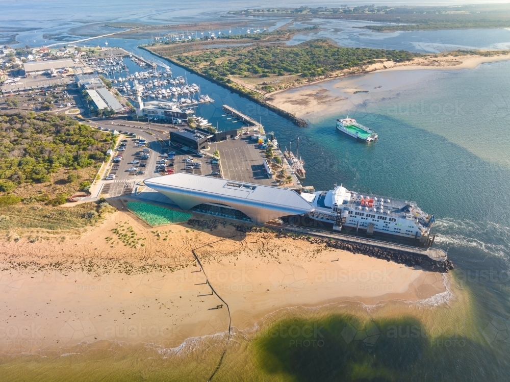 Image of Aerial view of sea ferry at a modern transit terminal ...