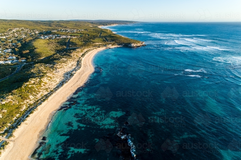 Image of Aerial view of seaside town, beach, headland, and ocean ...