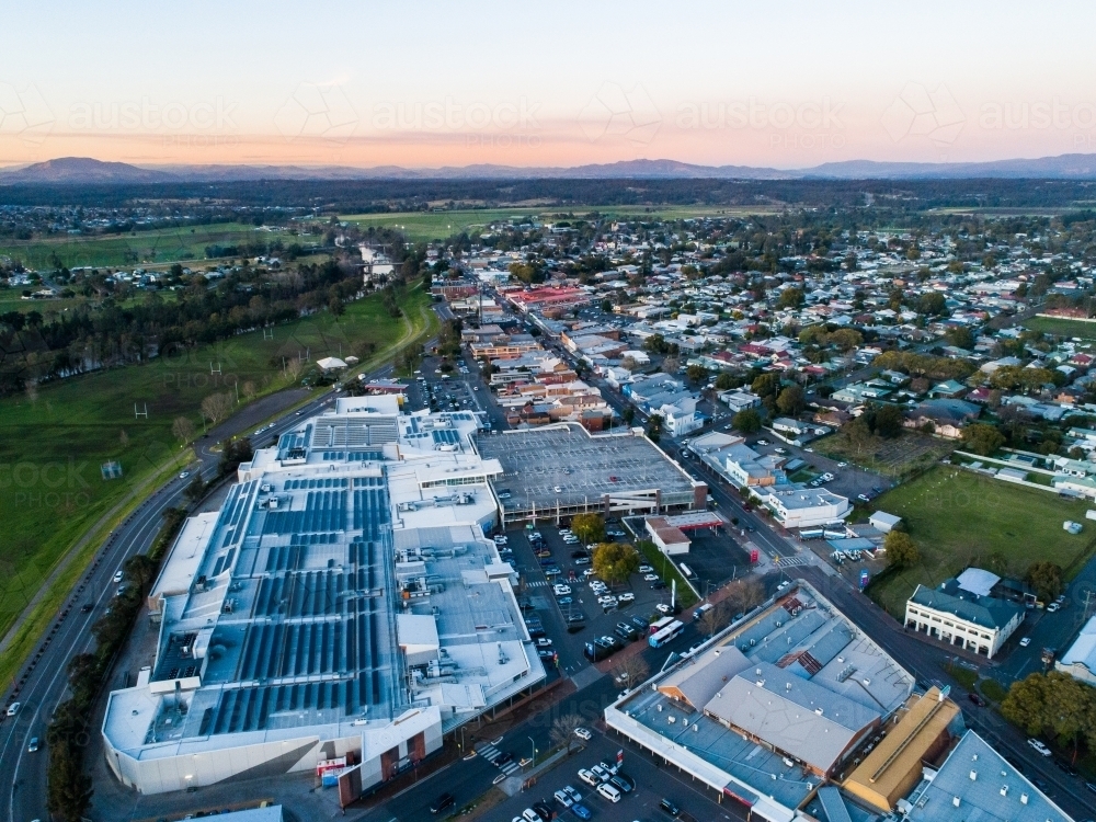 Image of Aerial view of shopping centre and carparks in town of ...