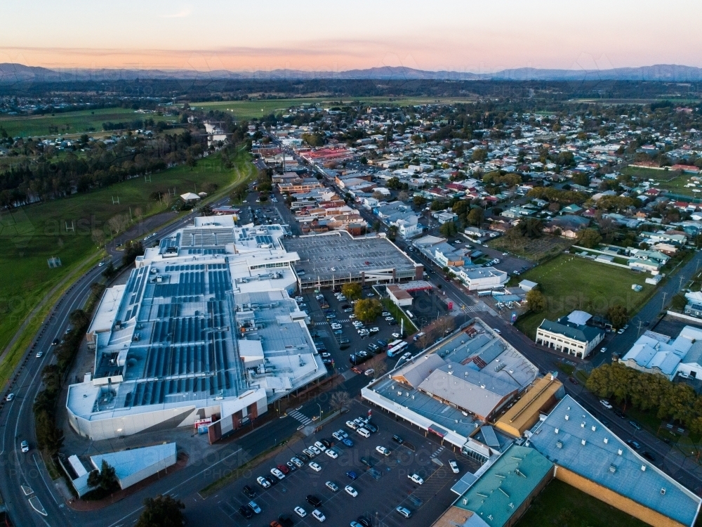 Image of Aerial view of shopping centre and carparks in town of ...