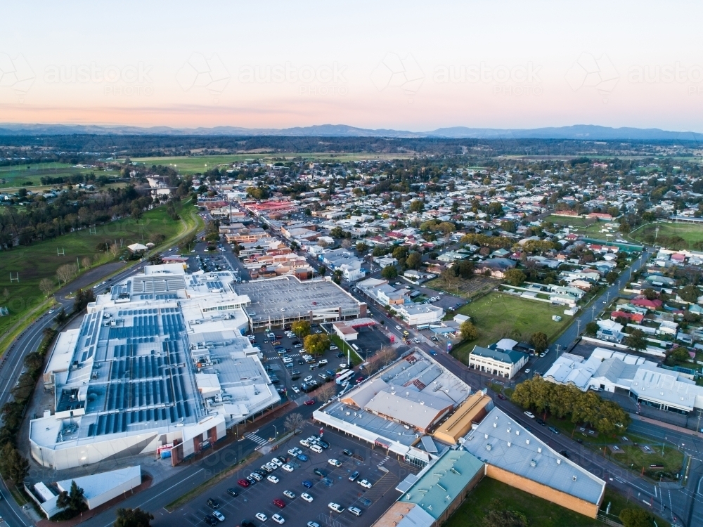 Image of Aerial view of shopping centre and carparks in town of ...